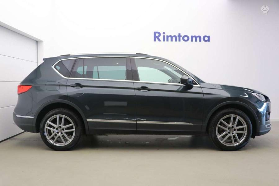 Grey SEAT Tarraco 2022 in Vilnius, with an engine capacity of 1.40 L and mileage of 190 thousand km for 18790 €, photo 4 on AUTOMOTO.COM.LV