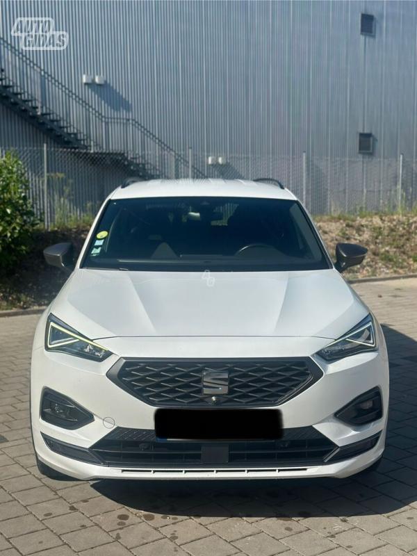 White SEAT Tarraco 2023 in Kaunas, with an engine capacity of 2.00 L and mileage of 235 thousand km for 18999 €, photo 4 on AUTOMOTO.COM.LV