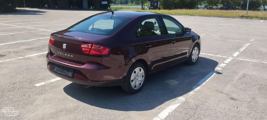 Red SEAT Toledo 2013 in Siauliai, with an engine capacity of 1.20 L and mileage of 266 thousand km for 4350 €, photo 1 on AUTOMOTO.COM.LV