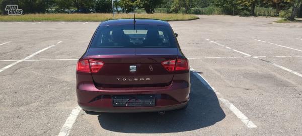 Red SEAT Toledo 2013 in Siauliai, with an engine capacity of 1.20 L and mileage of 266 thousand km for 4350 €, photo 8 on AUTOMOTO.COM.LV