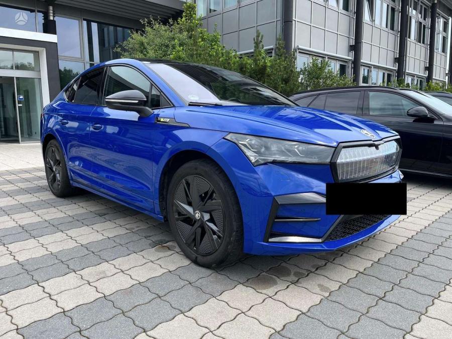 Blue Skoda Enyaq 2023 in Vilnius, with an engine capacity of 0.00 L and mileage of 83 thousand km for 36999 €, photo 4 on AUTOMOTO.COM.LV