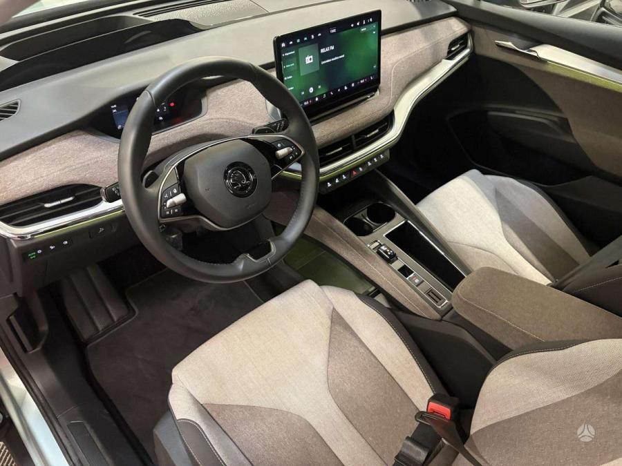 Green Skoda Enyaq 2024 in Vilnius, with an engine capacity of 0.00 L and mileage of 4 thousand km for 38000 €, photo 12 on AUTOMOTO.COM.LV