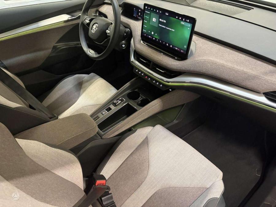 Green Skoda Enyaq 2024 in Vilnius, with an engine capacity of 0.00 L and mileage of 4 thousand km for 38000 €, photo 17 on AUTOMOTO.COM.LV