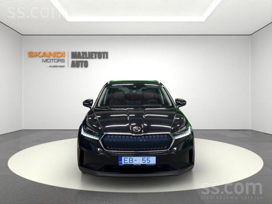 Black Skoda Enyaq iV 2021 in Riga, with an engine capacity of 0.00 L and mileage of 112 thousand km for 26990 €, photo 3 on AUTOMOTO.COM.LV
