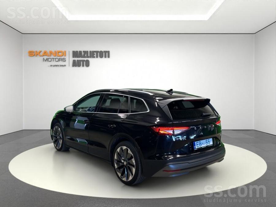 Black Skoda Enyaq iV 2021 in Riga, with an engine capacity of 0.00 L and mileage of 112 thousand km for 26990 €, photo 5 on AUTOMOTO.COM.LV
