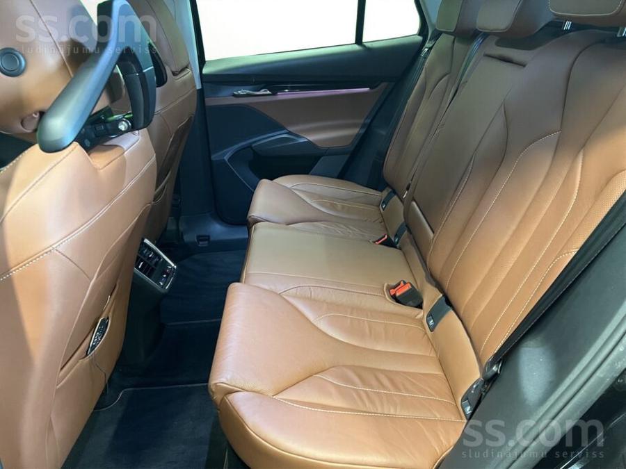 Black Skoda Enyaq iV 2021 in Riga, with an engine capacity of 0.00 L and mileage of 112 thousand km for 26990 €, photo 15 on AUTOMOTO.COM.LV