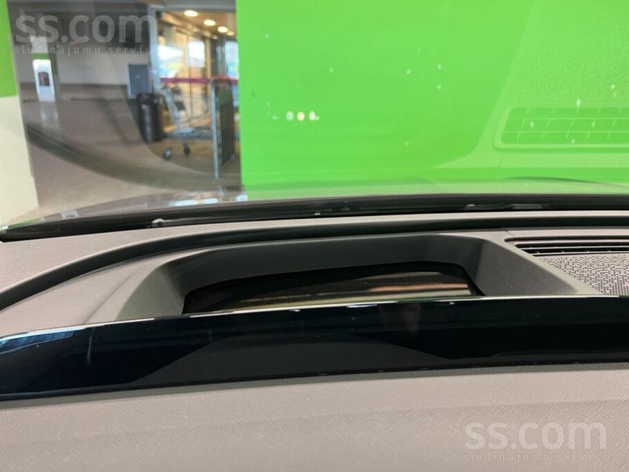 Black Skoda Enyaq iV 2021 in Riga, with an engine capacity of 0.00 L and mileage of 112 thousand km for 26990 €, photo 19 on AUTOMOTO.COM.LV