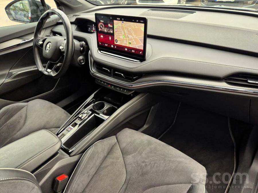 Black Skoda Enyaq iV 2023 in Riga, with an engine capacity of 0.00 L and mileage of 161 thousand km for 27590 €, photo 10 on AUTOMOTO.COM.LV