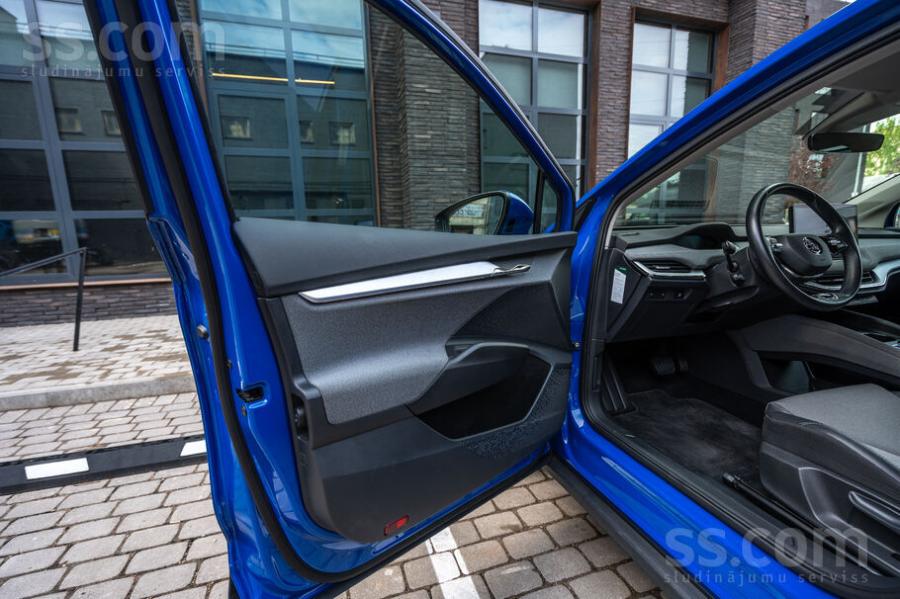 Blue Skoda Enyaq iV 2021 in Riga, with an engine capacity of 0.00 L and mileage of 49 thousand km for 26490 €, photo 18 on AUTOMOTO.COM.LV