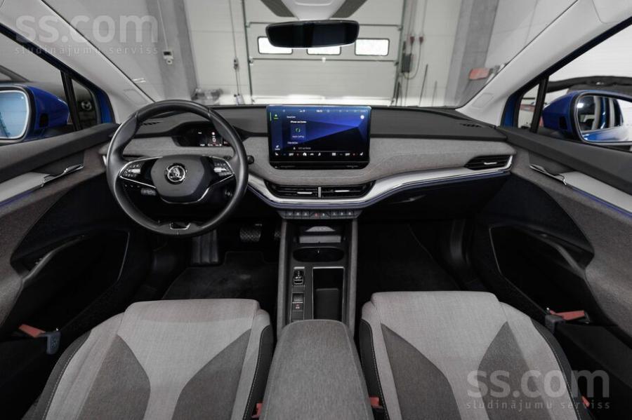 Blue Skoda Enyaq iV 2021 in Riga, with an engine capacity of 0.00 L and mileage of 135 thousand km for 23990 €, photo 12 on AUTOMOTO.COM.LV