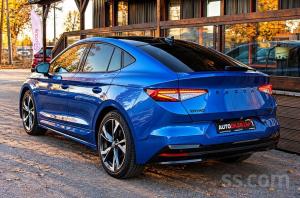 Blue Skoda Enyaq iV 2023 in Riga, with an engine capacity of 0.00 L and mileage of 0 thousand km for 29900 €, photo 3 on AUTOMOTO.COM.LV