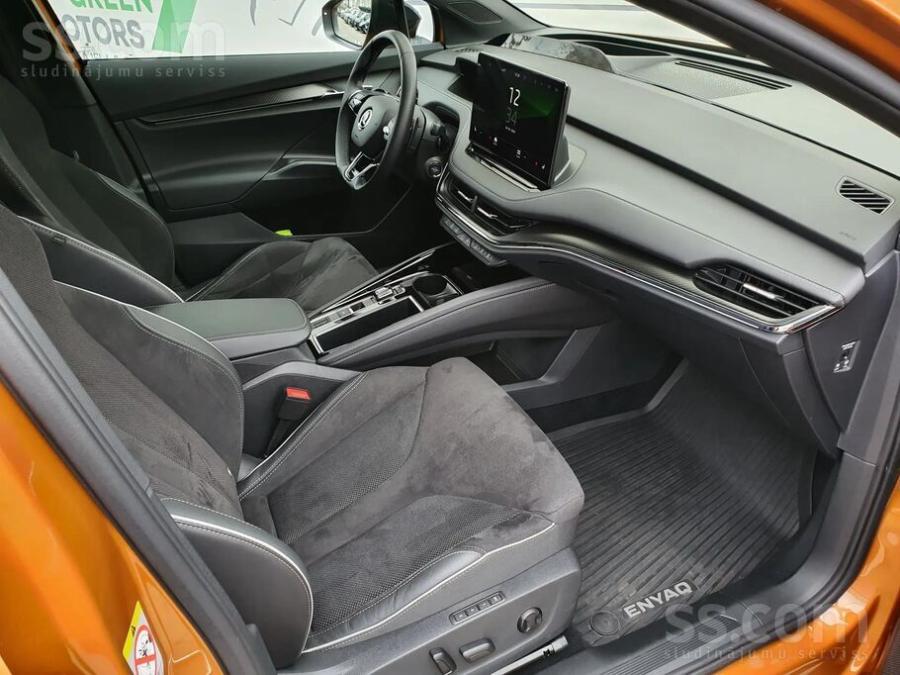 Brown Skoda Enyaq iV 2023 in Riga, with an engine capacity of 0.00 L and mileage of 15 thousand km for 49900 €, photo 12 on AUTOMOTO.COM.LV