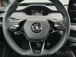 Brown Skoda Enyaq iV 2023 in Riga, with an engine capacity of 0.00 L and mileage of 15 thousand km for 49900 €, photo 18 on AUTOMOTO.COM.LV