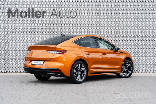 Orange Skoda Enyaq iV 2024 in Riga, with an engine capacity of 0.00 L and mileage of 39 thousand km for 43600 €, photo 4 on AUTOMOTO.COM.LV