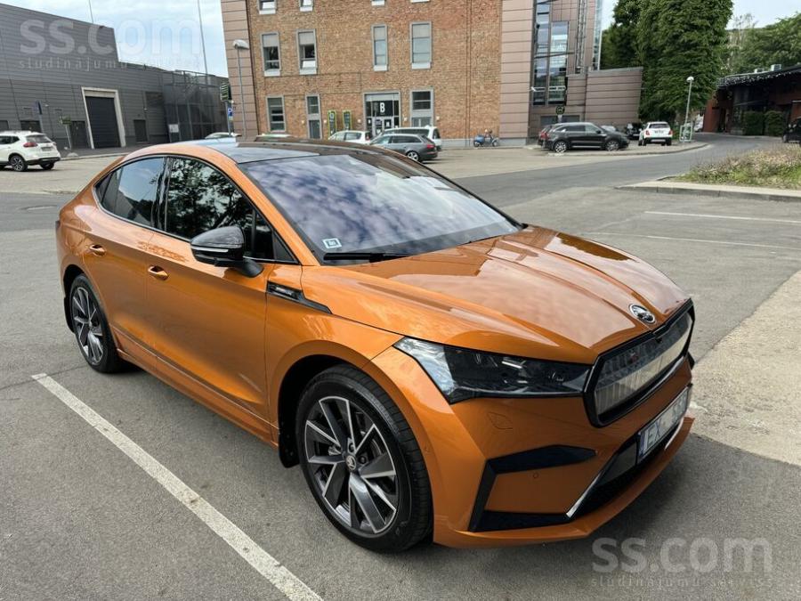 Orange Skoda Enyaq iV 2023 in Riga, with an engine capacity of 0.00 L and mileage of 44 thousand km for 33000 €, photo 1 on AUTOMOTO.COM.LV