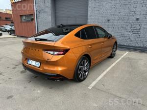 Orange Skoda Enyaq iV 2023 in Riga, with an engine capacity of 0.00 L and mileage of 44 thousand km for 33000 €, photo 4 on AUTOMOTO.COM.LV
