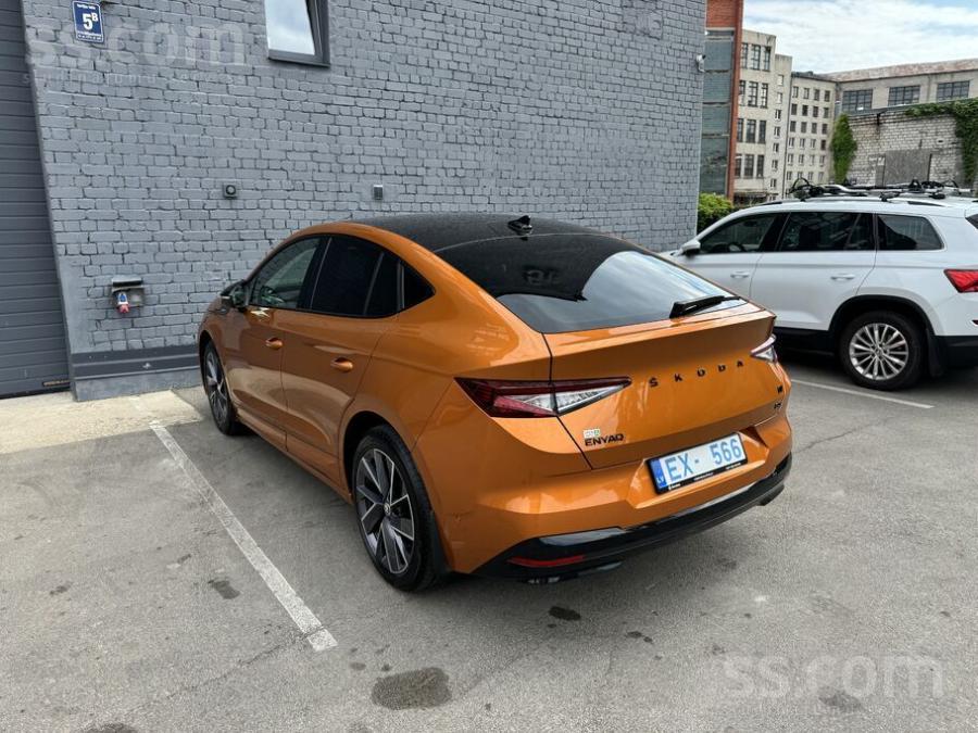 Orange Skoda Enyaq iV 2023 in Riga, with an engine capacity of 0.00 L and mileage of 44 thousand km for 33000 €, photo 5 on AUTOMOTO.COM.LV