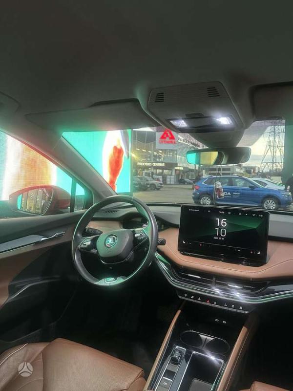 Sarkans Skoda Enyaq iV 2021 Klaipėda, ar dzinēja tilpumu 0.00 L un nobraukumu 60 tūkst. km par 23800 €, foto 11 vietnē AUTOMOTO.COM.LV