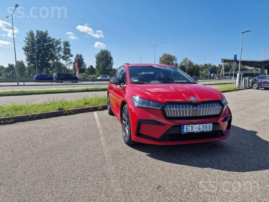 Red Skoda Enyaq iV 2022 in Riga, with an engine capacity of 0.00 L and mileage of 69 thousand km for 29000 €, photo 1 on AUTOMOTO.COM.LV