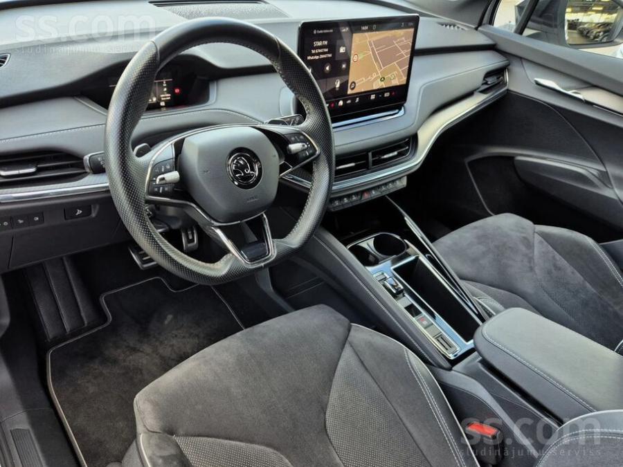 White Skoda Enyaq iV 2021 in Riga, with an engine capacity of 0.00 L and mileage of 146 thousand km for 26490 €, photo 8 on AUTOMOTO.COM.LV