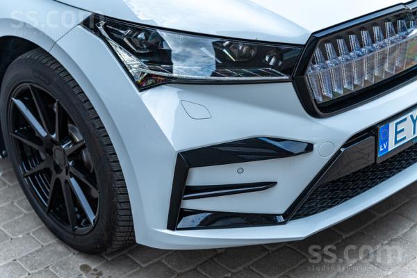 White Skoda Enyaq iV 2024 in Riga, with an engine capacity of 0.00 L and mileage of 14 thousand km for 43500 €, photo 10 on AUTOMOTO.COM.LV
