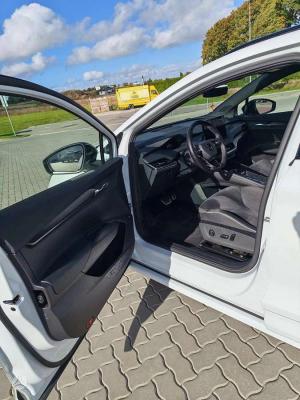 White Skoda Enyaq 2023 in Klaipeda, with an engine capacity of 0.00 L and mileage of 58 thousand km for 28700 €, photo 7 on AUTOMOTO.COM.LV
