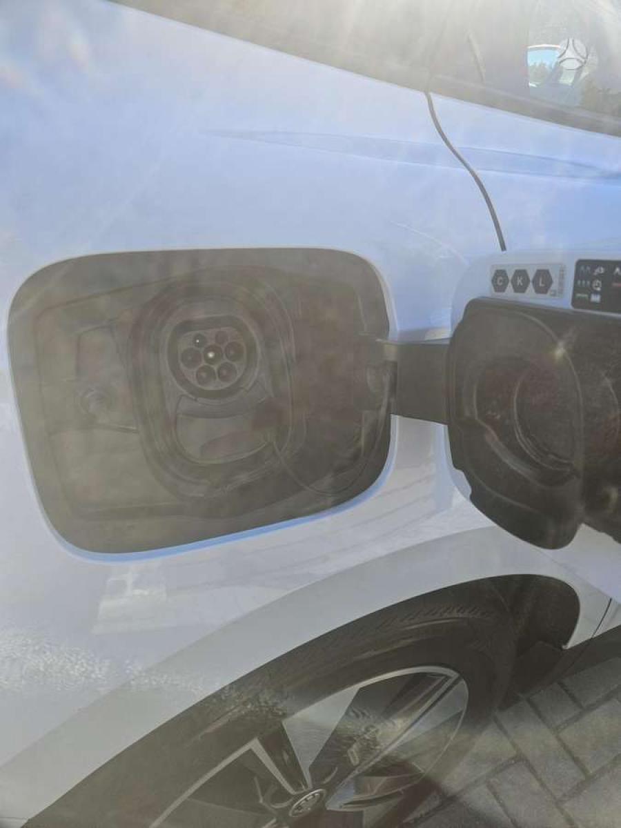 White Skoda Enyaq 2022 in Palanga, with an engine capacity of 0.00 L and mileage of 59 thousand km for 22750 €, photo 12 on AUTOMOTO.COM.LV