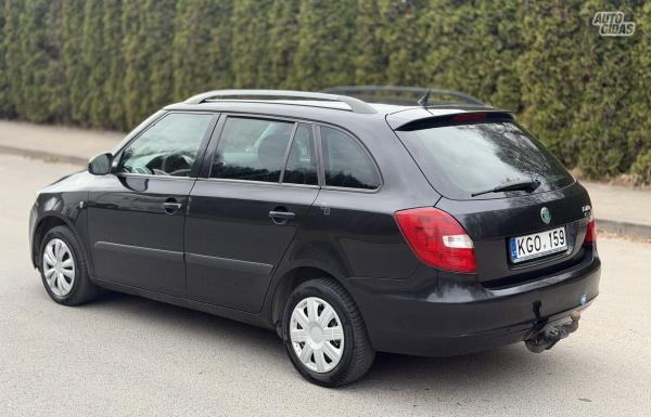 Black Skoda Fabia 2009 in Vilnius, with an engine capacity of 1.40 L and mileage of 260 thousand km for 1750 €, photo 4 on AUTOMOTO.COM.LV