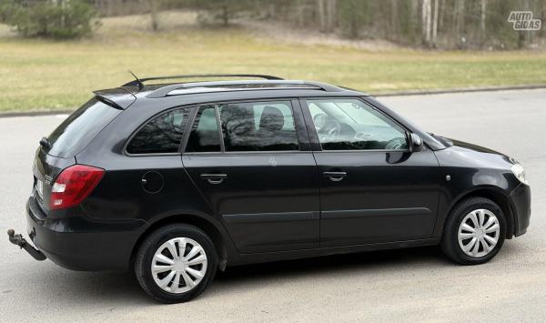 Black Skoda Fabia 2009 in Vilnius, with an engine capacity of 1.40 L and mileage of 260 thousand km for 1750 €, photo 8 on AUTOMOTO.COM.LV
