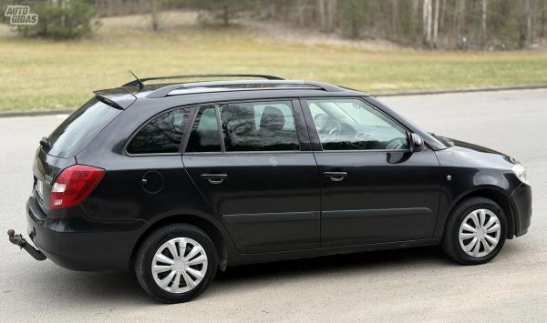 Black Skoda Fabia 2009 in Vilnius, with an engine capacity of 1.40 L and mileage of 260 thousand km for 1650 €, photo 6 on AUTOMOTO.COM.LV