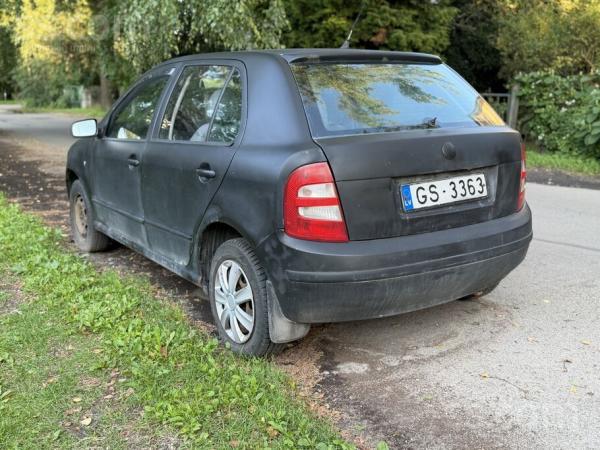 Melns Skoda Fabia 2002 Rīga, ar dzinēja tilpumu 1.90 L un nobraukumu 340 tūkst. km par 600 €, foto 3 vietnē AUTOMOTO.COM.LV