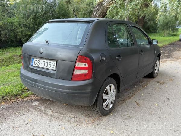 Melns Skoda Fabia 2002 Rīga, ar dzinēja tilpumu 1.90 L un nobraukumu 340 tūkst. km par 600 €, foto 4 vietnē AUTOMOTO.COM.LV