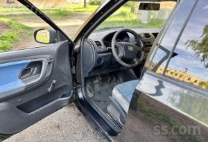 Melns Skoda Fabia 2007 Daugavpils, ar dzinēja tilpumu 1.20 L un nobraukumu 264 tūkst. km par 1300 €, foto 7 vietnē AUTOMOTO.COM.LV