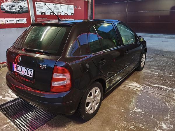 Melns Skoda Fabia 2007 Mažeikiai, ar dzinēja tilpumu 1.40 L un nobraukumu 215 tūkst. km par 500 €, foto 4 vietnē AUTOMOTO.COM.LV