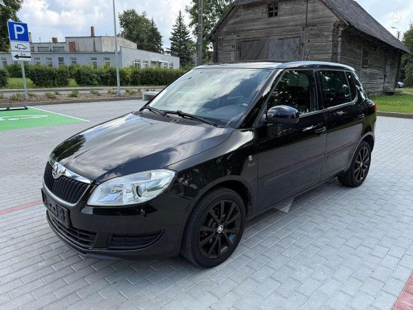 Black Skoda Fabia 2014 in Rokiskis, with an engine capacity of 1.20 L and mileage of 69 thousand km for 4299 €, photo 1 on AUTOMOTO.COM.LV