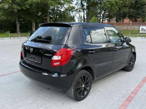 Black Skoda Fabia 2014 in Rokiskis, with an engine capacity of 1.20 L and mileage of 69 thousand km for 4299 €, photo 5 on AUTOMOTO.COM.LV