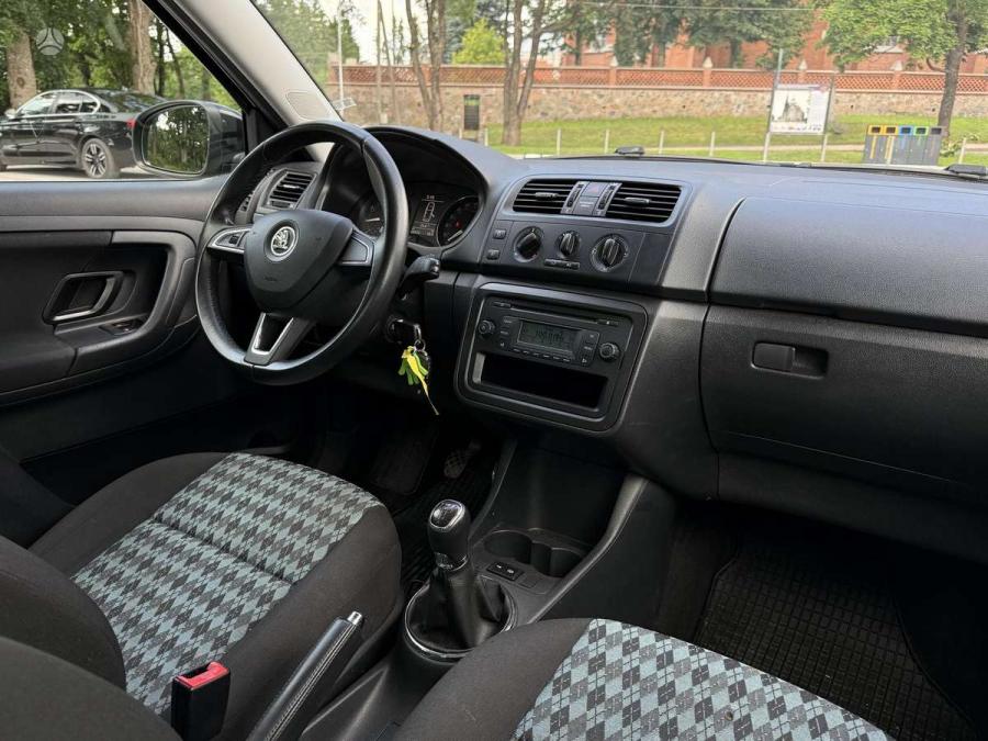 Black Skoda Fabia 2014 in Rokiskis, with an engine capacity of 1.20 L and mileage of 69 thousand km for 4299 €, photo 14 on AUTOMOTO.COM.LV