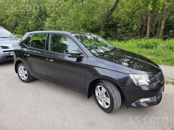 Black Skoda Fabia 2017 in Riga, with an engine capacity of 1.20 L and mileage of 79 thousand km for 7600 €, photo 1 on AUTOMOTO.COM.LV