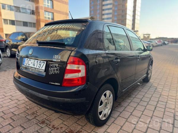 Black Skoda Fabia 2005 in Riga, with an engine capacity of 1.20 L and mileage of 0 thousand km for 1300 €, photo 6 on AUTOMOTO.COM.LV