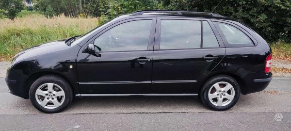 Black Skoda Fabia 2005 in Vilnius, with an engine capacity of 1.39 L and mileage of 190 thousand km for 1950 €, photo 1 on AUTOMOTO.COM.LV