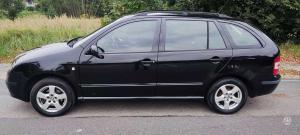 Black Skoda Fabia 2005 in Vilnius, with an engine capacity of 1.39 L and mileage of 190 thousand km for 1950 €, photo  on AUTOMOTO.COM.LV