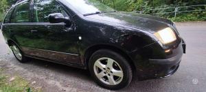 Black Skoda Fabia 2005 in Vilnius, with an engine capacity of 1.39 L and mileage of 190 thousand km for 1950 €, photo 5 on AUTOMOTO.COM.LV