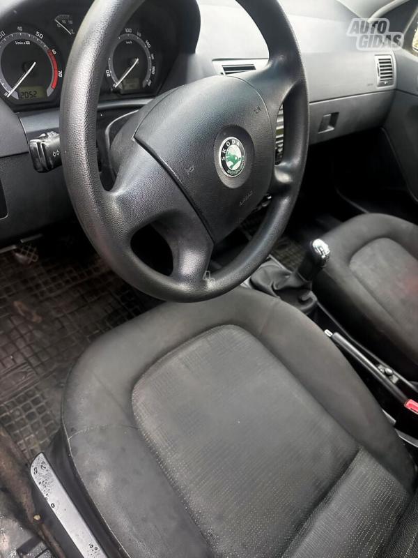 Black Skoda Fabia 2006 in Vilnius, with an engine capacity of 1.20 L and mileage of 109 thousand km for 1850 €, photo 5 on AUTOMOTO.COM.LV