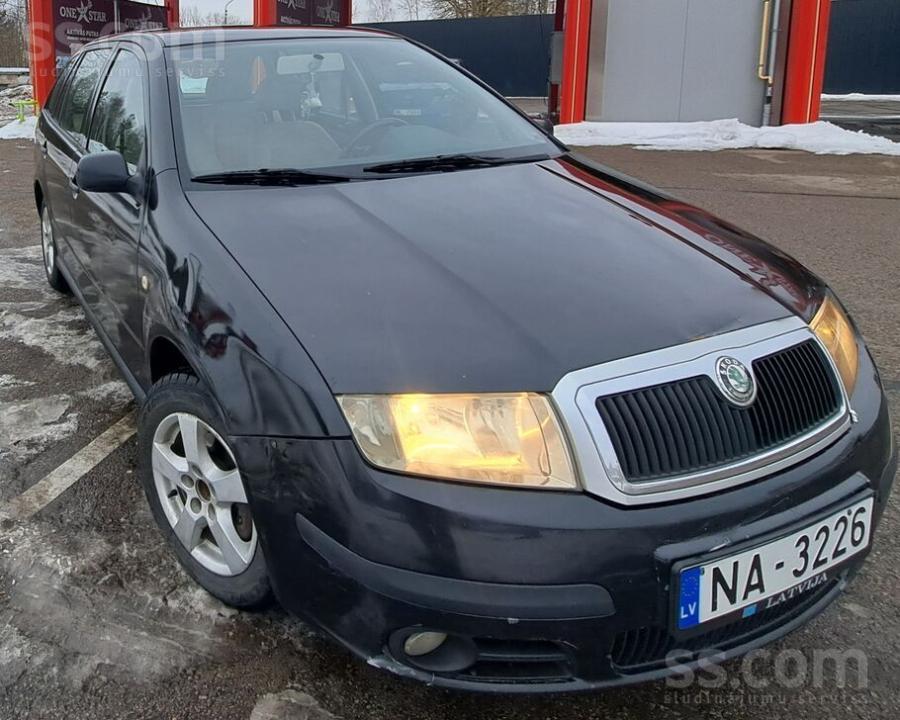 Black Skoda Fabia 2006 in Daugavpils, with an engine capacity of 1.40 L and mileage of 391 thousand km for 950 €, photo 1 on AUTOMOTO.COM.LV
