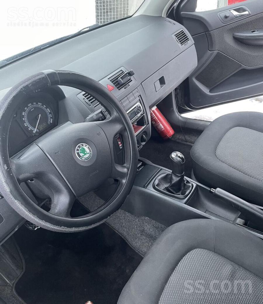 Melns Skoda Fabia 2007 Rīga, ar dzinēja tilpumu 1.90 L un nobraukumu 317 tūkst. km par 1400 €, foto 6 vietnē AUTOMOTO.COM.LV
