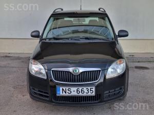 Black Skoda Fabia 2010 in Ogre, with an engine capacity of 1.40 L and mileage of 210 thousand km for 3150 €, photo 2 on AUTOMOTO.COM.LV