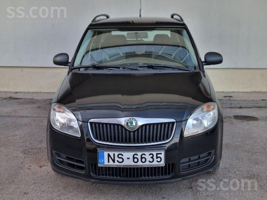 Black Skoda Fabia 2010 in Ogre, with an engine capacity of 1.40 L and mileage of 210 thousand km for 3150 €, photo 2 on AUTOMOTO.COM.LV