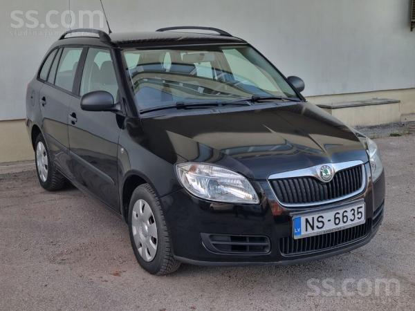 Black Skoda Fabia 2010 in Ogre, with an engine capacity of 1.40 L and mileage of 210 thousand km for 3150 €, photo 3 on AUTOMOTO.COM.LV