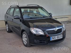 Black Skoda Fabia 2010 in Ogre, with an engine capacity of 1.40 L and mileage of 210 thousand km for 3150 €, photo 3 on AUTOMOTO.COM.LV