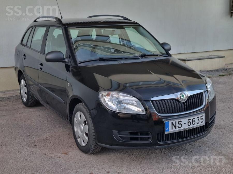 Black Skoda Fabia 2010 in Ogre, with an engine capacity of 1.40 L and mileage of 210 thousand km for 3150 €, photo 3 on AUTOMOTO.COM.LV